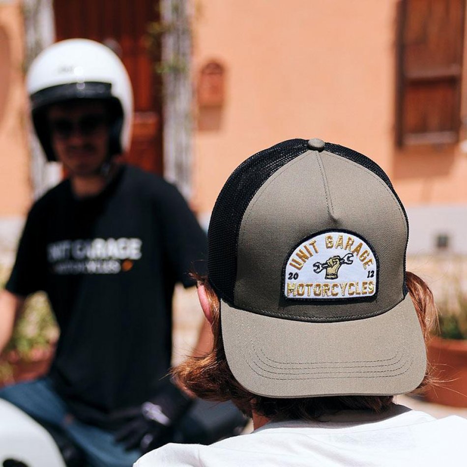 Trucker hat with green logo